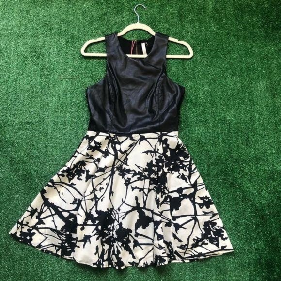 Dresses | Black Ivory Faux Leather Dress With Abstract Print On Skirt ...